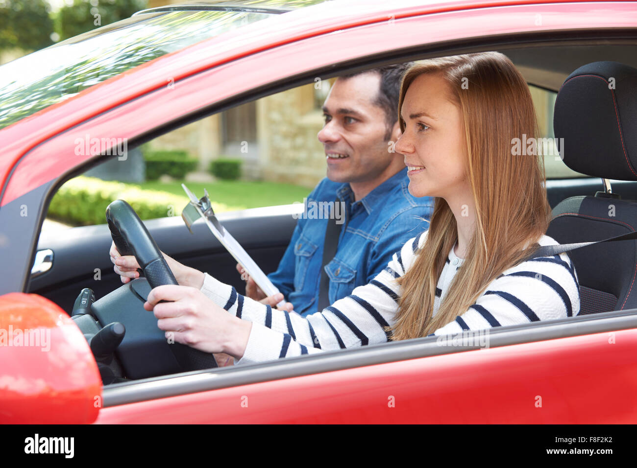Woman driving car uk hi-res stock photography and images - Alamy