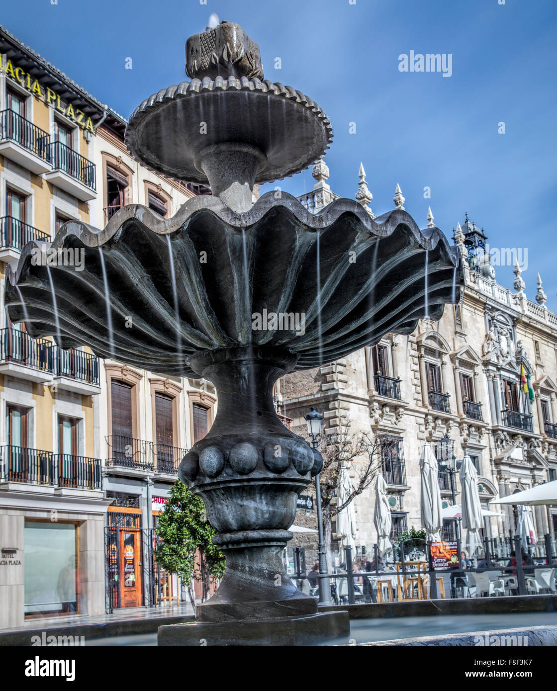 Fountain flowing with water and a pomegranate on top at the Plaza Mayor ...