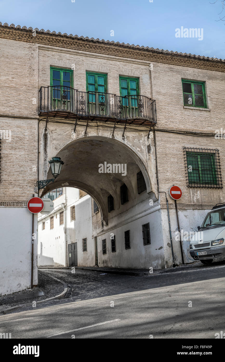 Arch over two buildings joining each other - one a convent and the ...