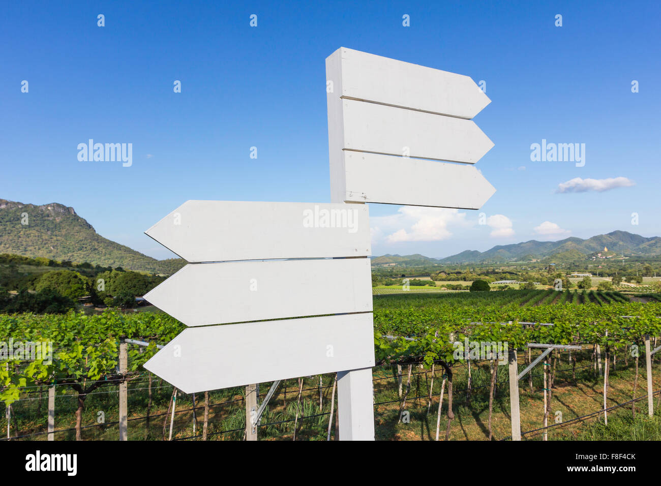 wooden sign on field grass mountain Stock Photo - Alamy