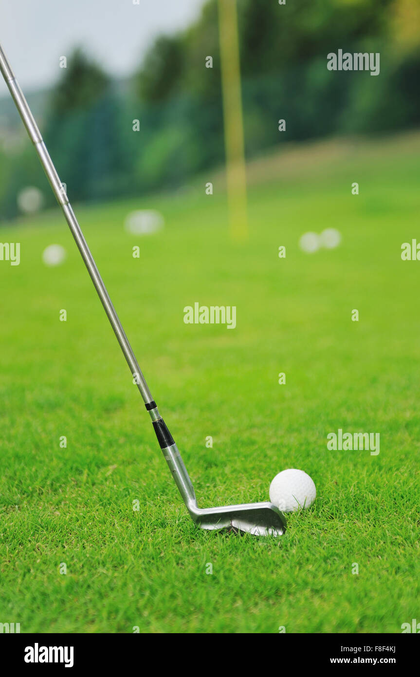 golf ball on sports golf course and hole Stock Photo - Alamy