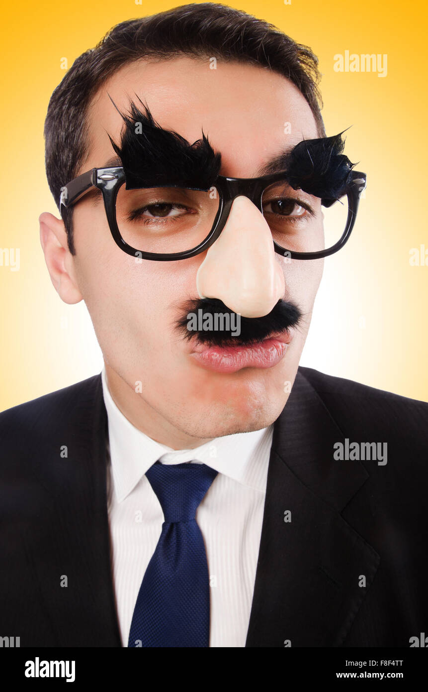 Funny businessman with eyebrows and moustache Stock Photo - Alamy
