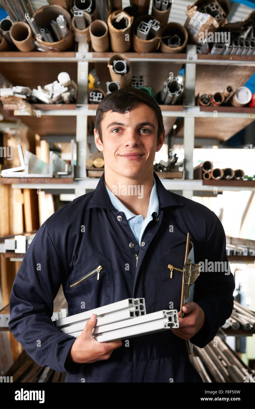 Portrait Of Factory Worker In Component Store Stock Photo - Alamy