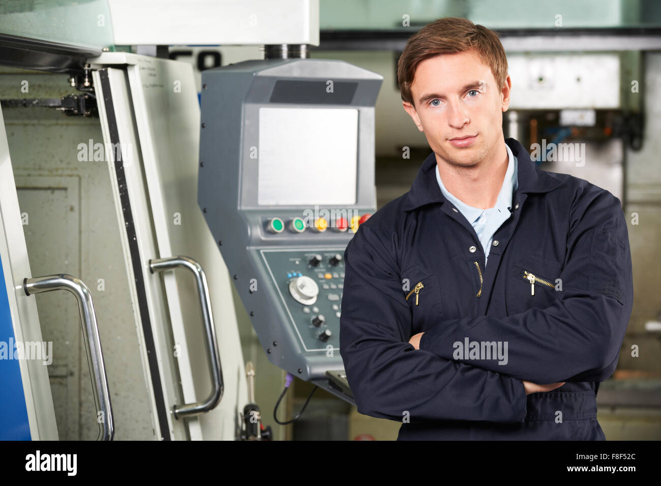 Engineer operating cutting machine hi-res stock photography and images ...