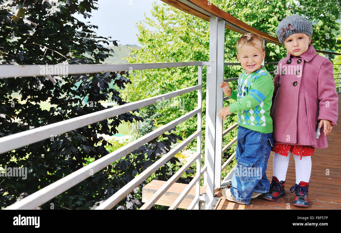 beautiful children posing in fashionable clothing outdoor Stock Photo ...