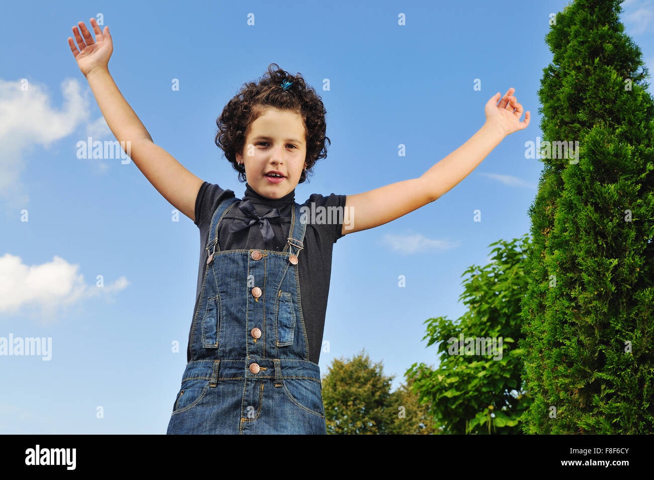 child fashion with beautiful little child outdoor in nature Stock Photo ...