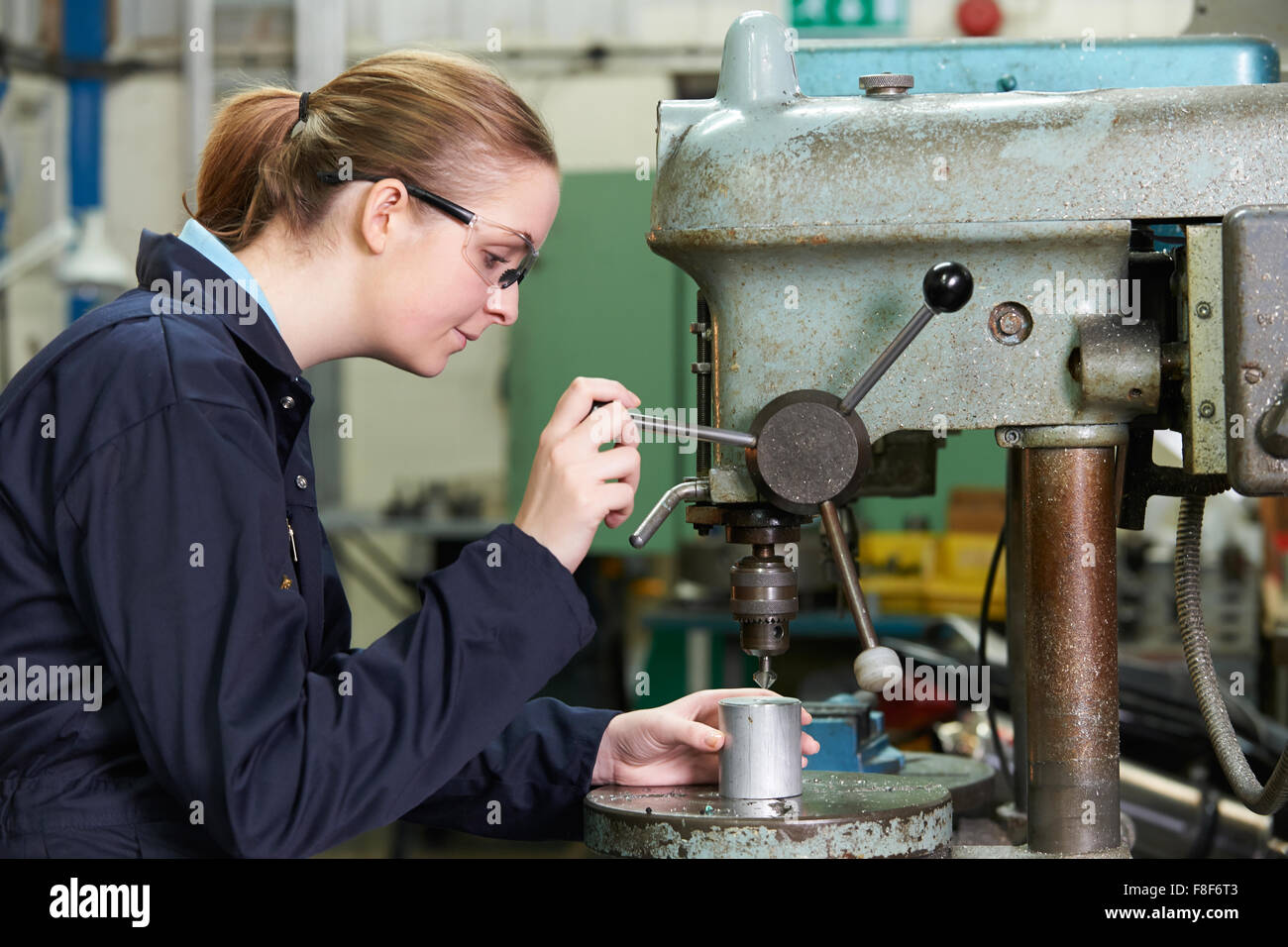 Female drilling hi-res stock photography and images - Alamy