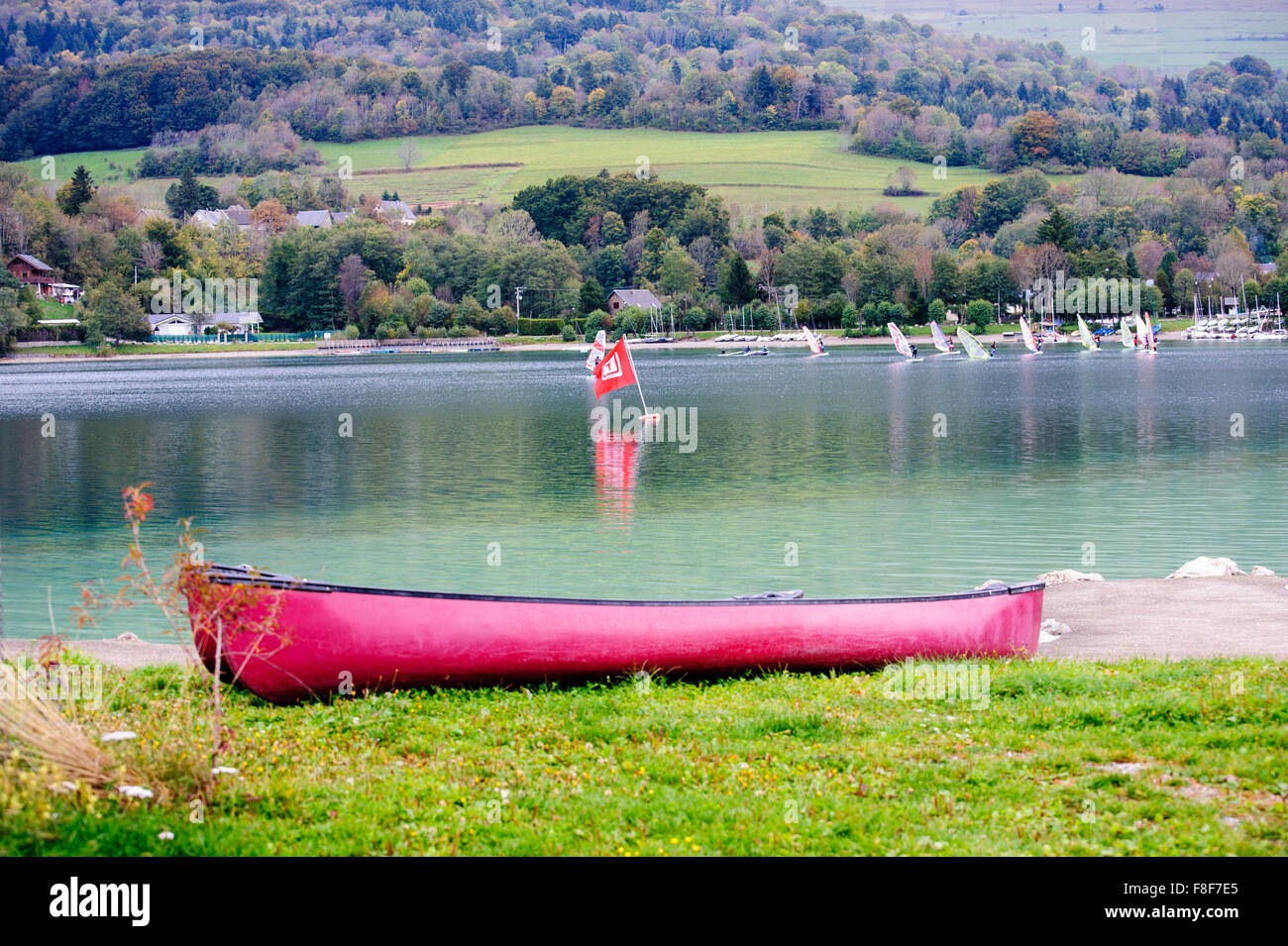 Two red canoes on the Grand lac de Laffrey is one of the Laffrey lakes ...