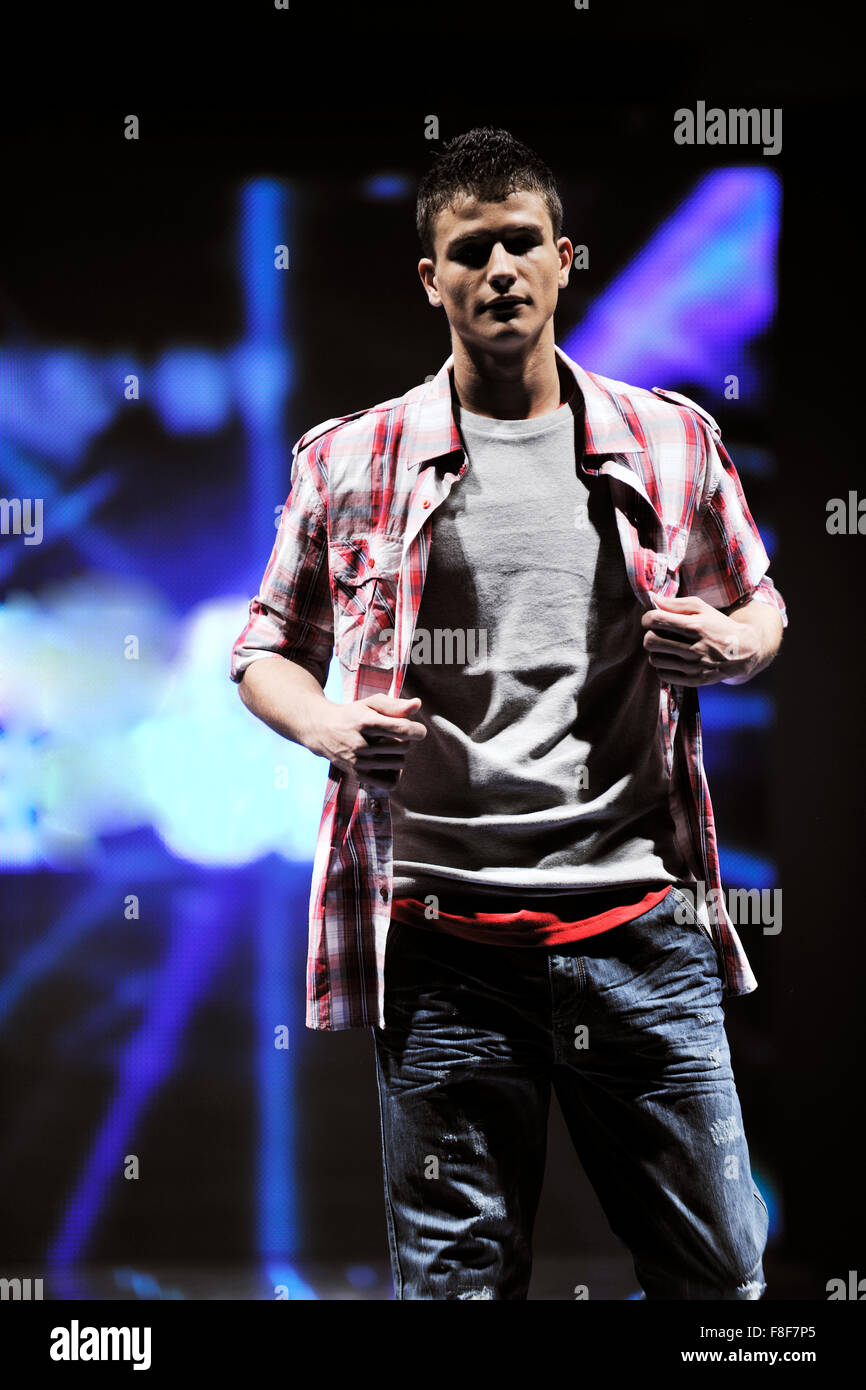 handsome man male model at fashion show stage event Stock Photo - Alamy