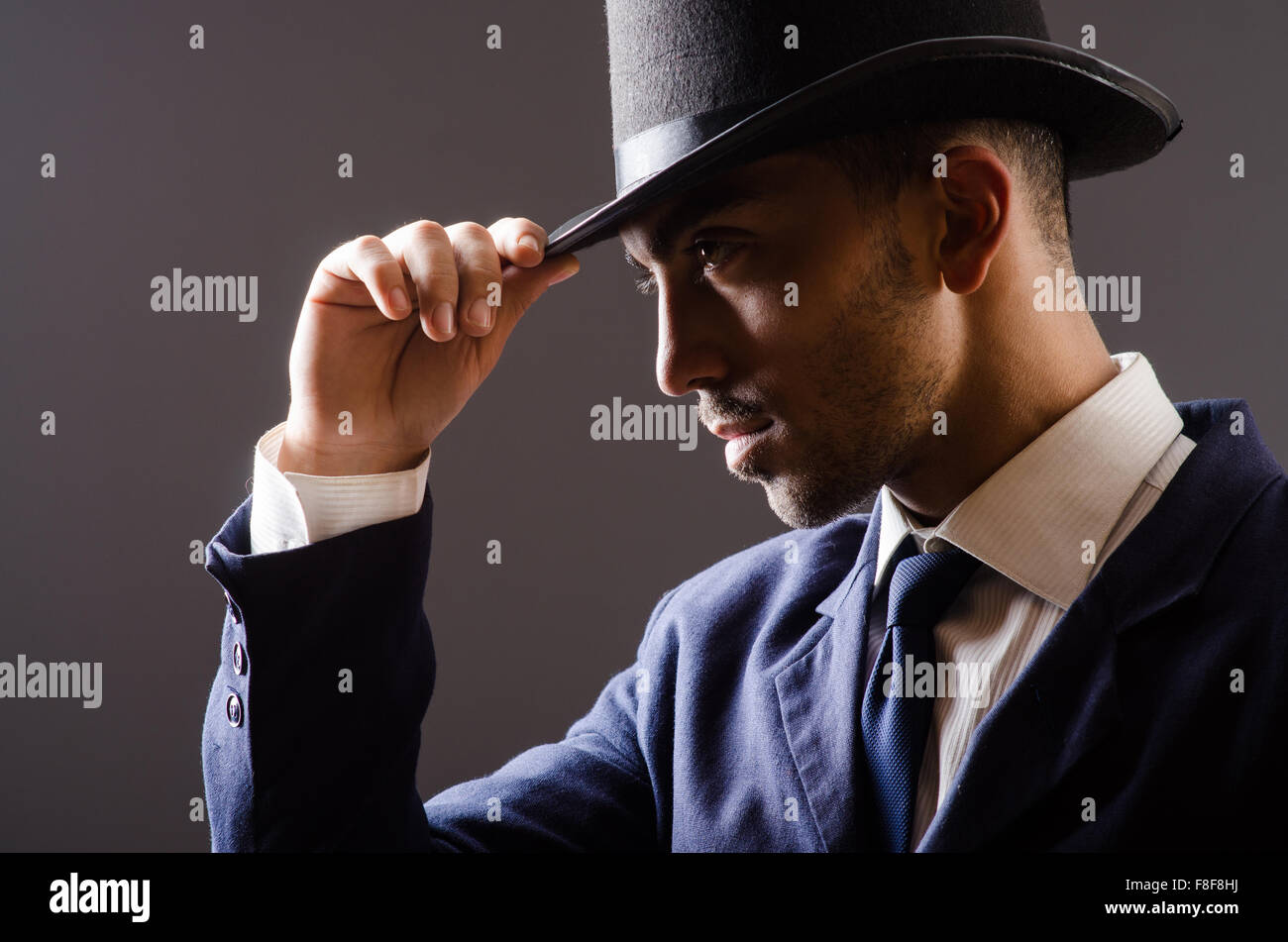 Man with hat in vintage concept Stock Photo - Alamy
