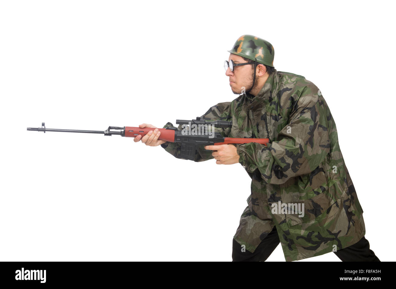 Military man with a gun isolated on white Stock Photo - Alamy