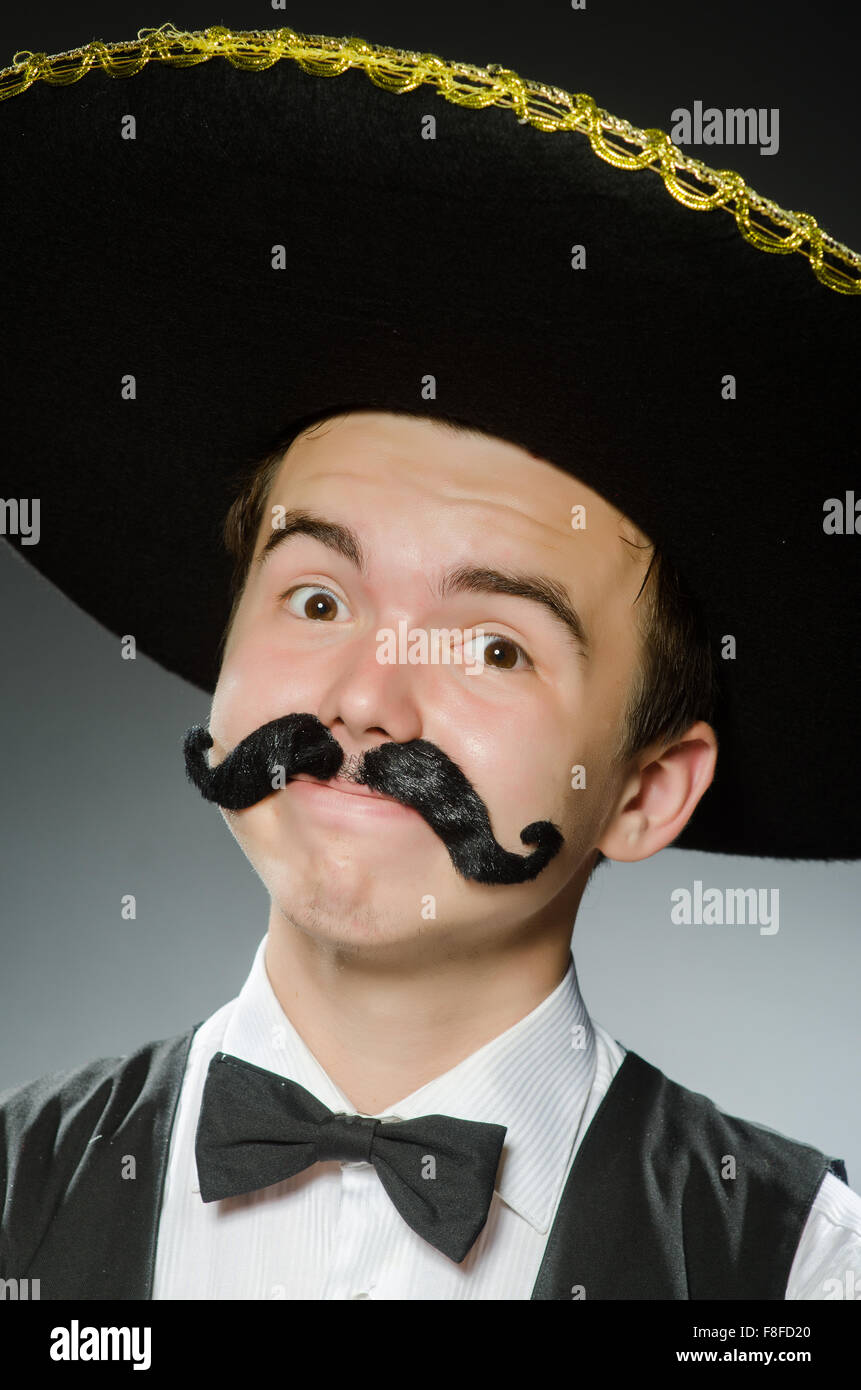 Smiling mexican with sombrero isolated on white Stock Photo - Alamy