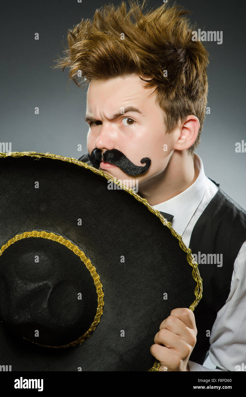 Smiling mexican with sombrero isolated on white Stock Photo - Alamy