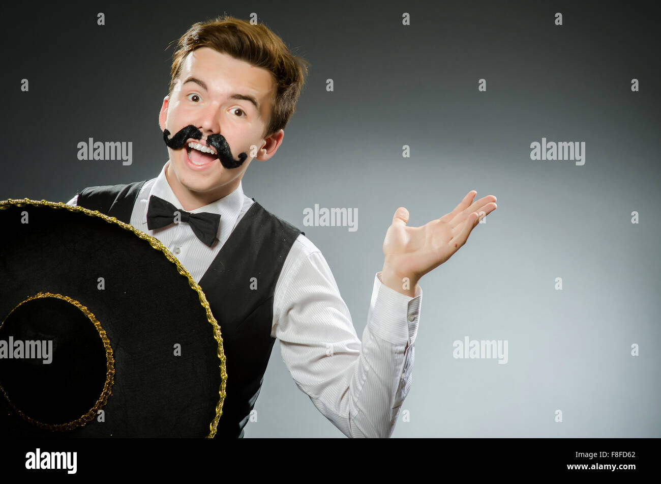 Smiling mexican with sombrero isolated on white Stock Photo - Alamy