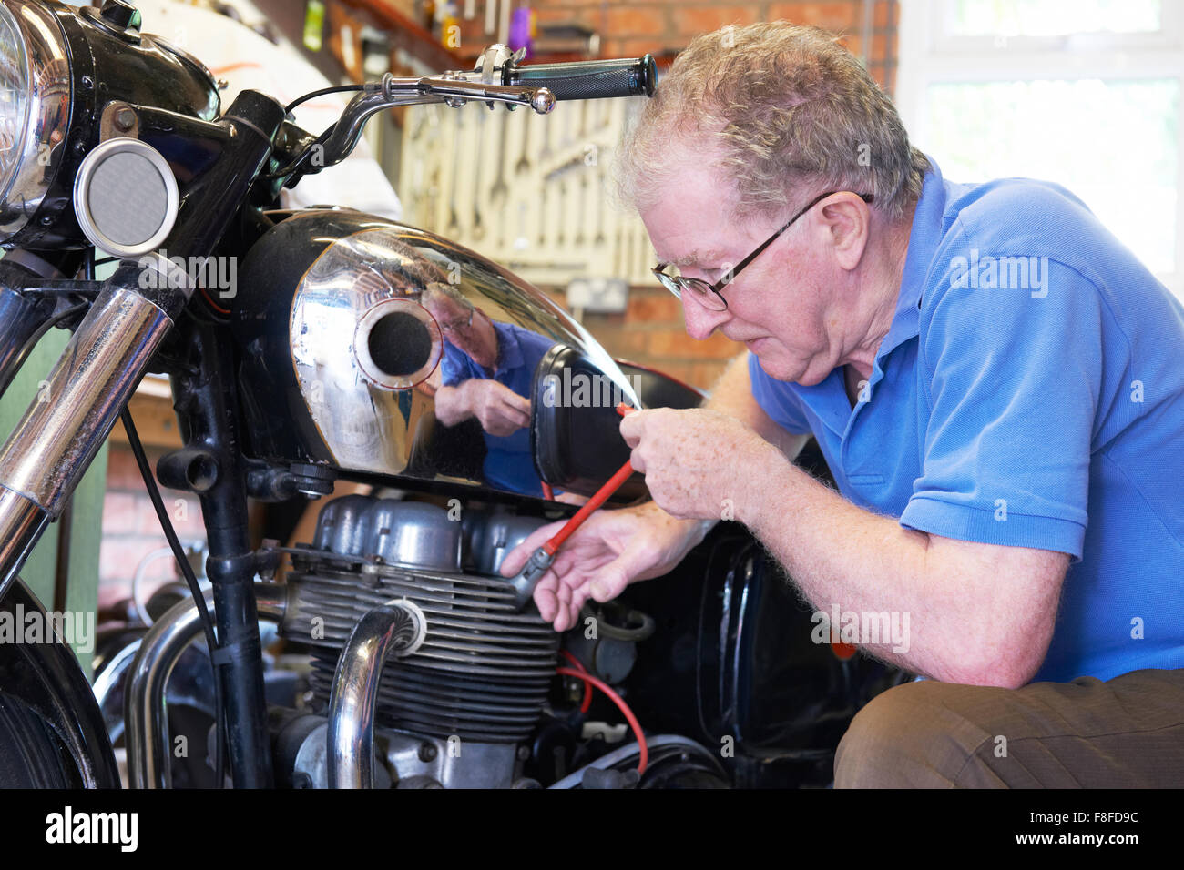 Old man on motorcycle hi-res stock photography and images - Alamy