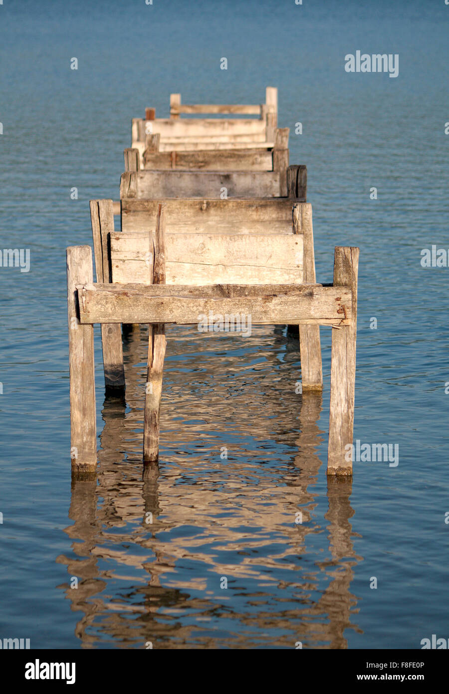 Old pier poles Stock Photo - Alamy