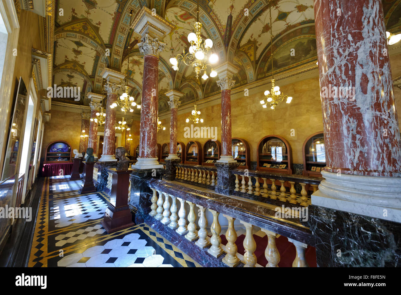 The beautiful corridor with marble columns on the first floor of the ...