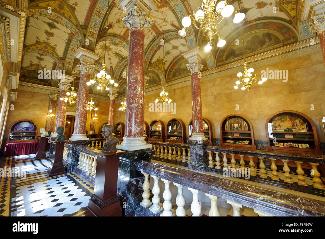 The beautiful corridor with marble columns on the first floor of the ...
