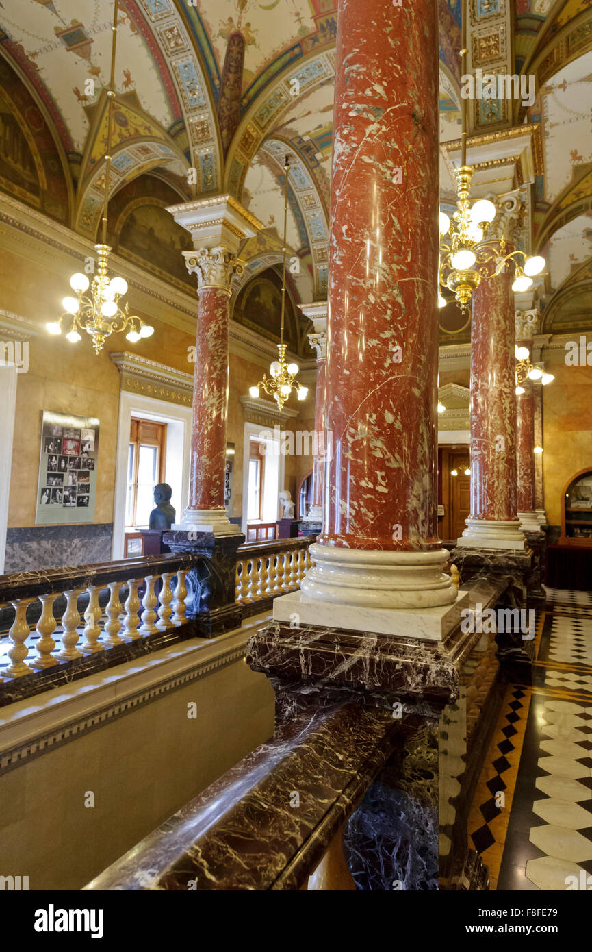 The beautiful corridor with marble columns on the first floor of the ...