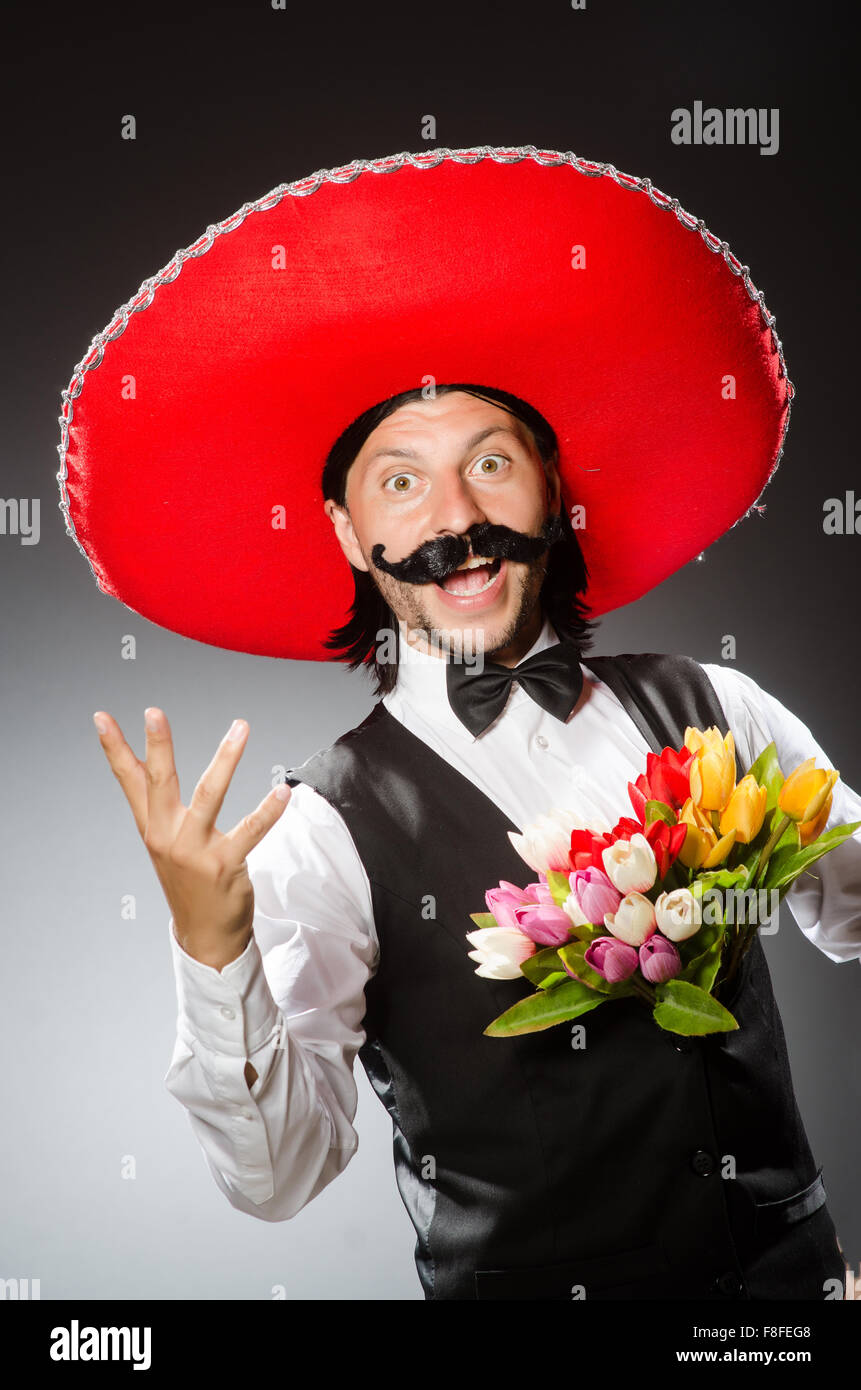Mexican man wears sombrero isolated on white Stock Photo - Alamy