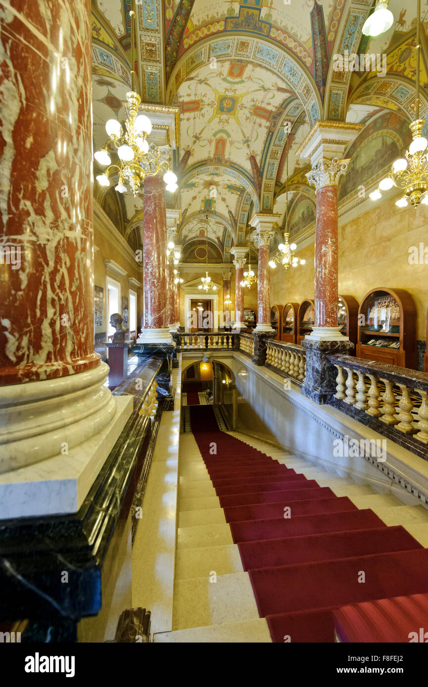 The beautiful interior with marble pillars and decorated ceiling at the ...