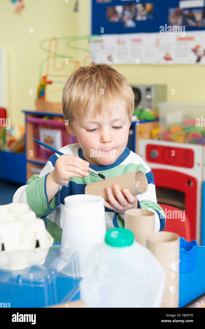 Boy Building Junk Model In Pre School Class Stock Photo - Alamy