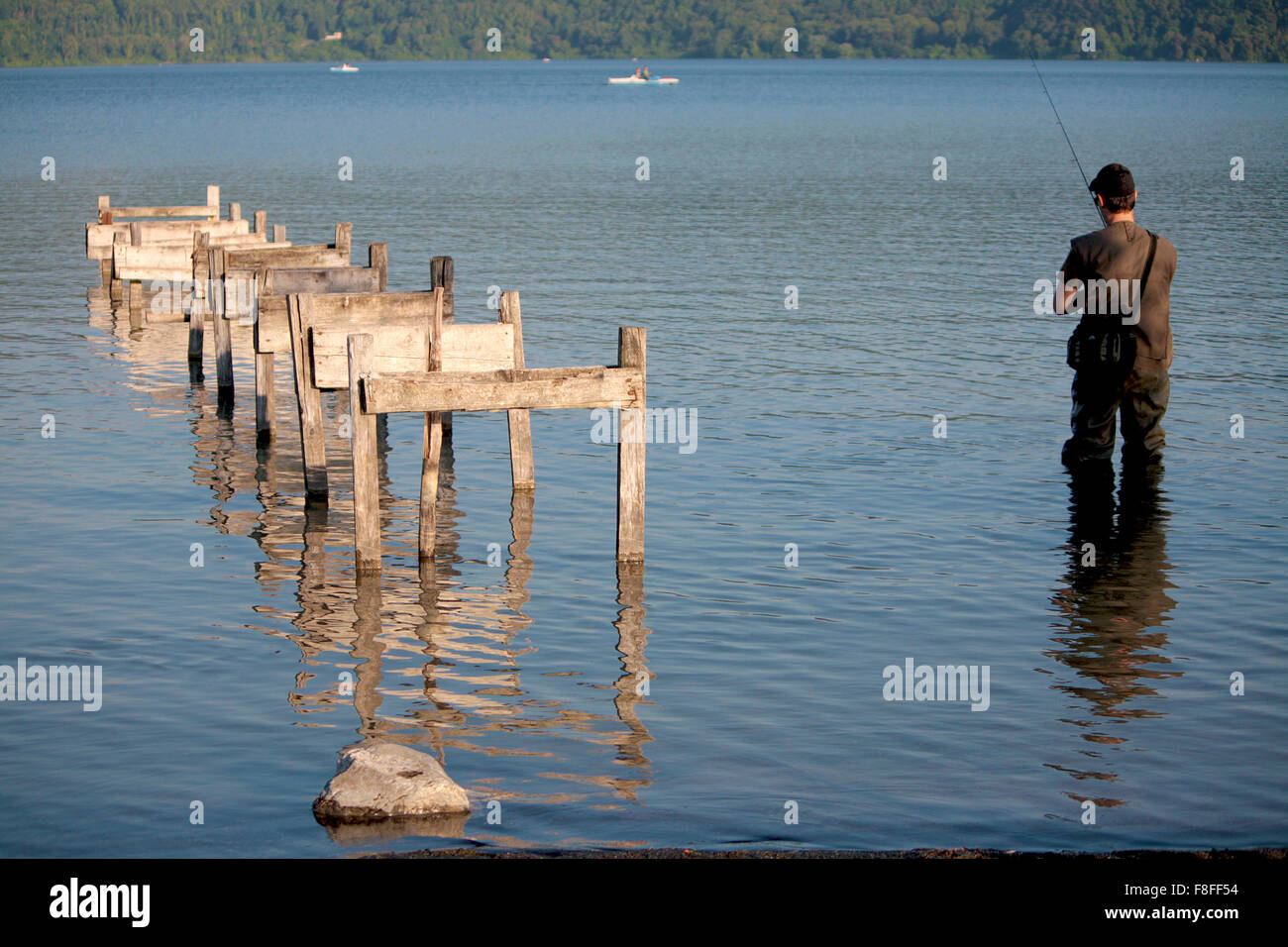 Man fishing in the lake Stock Photo - Alamy