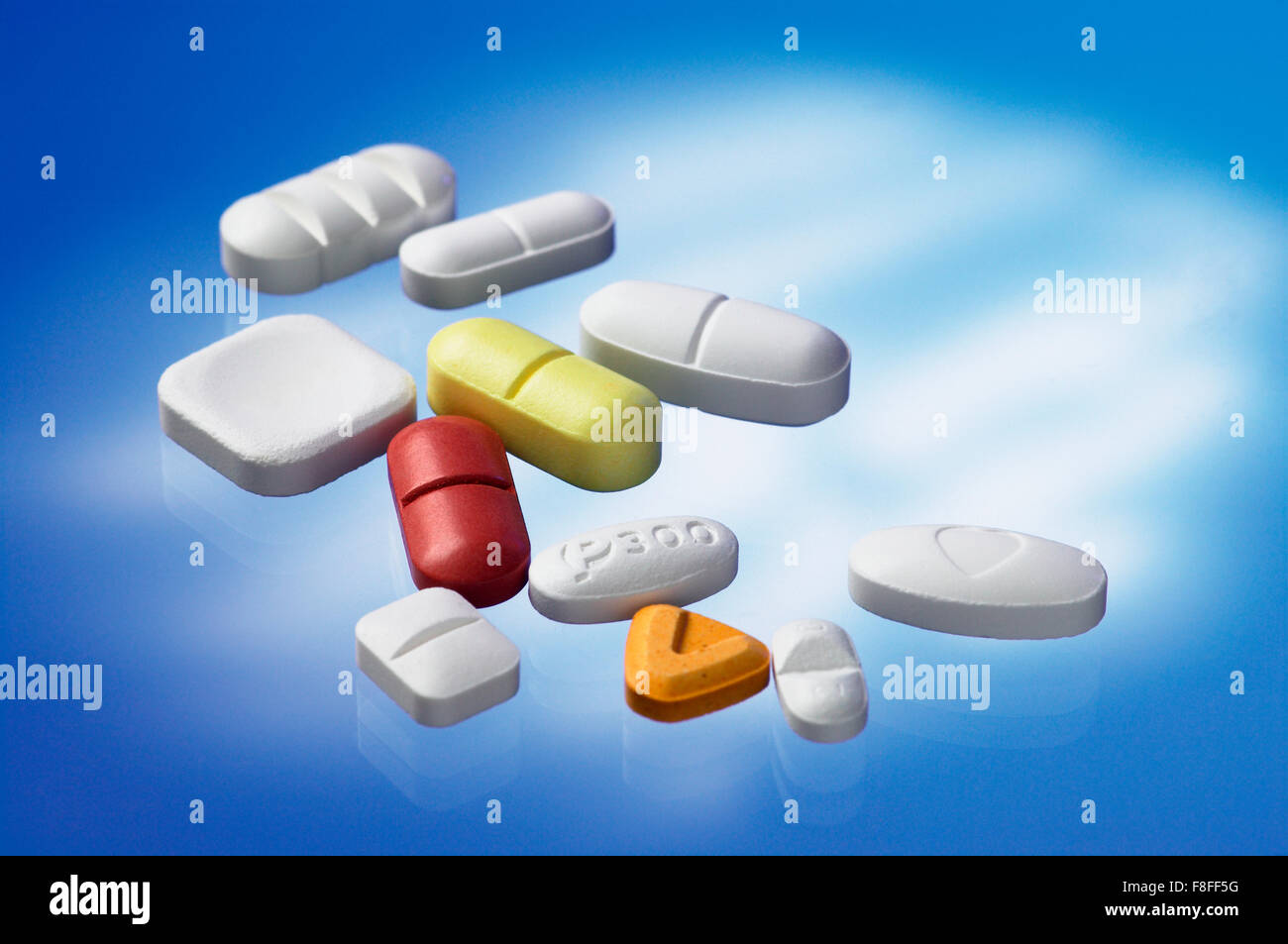 pile of different pills Stock Photo - Alamy