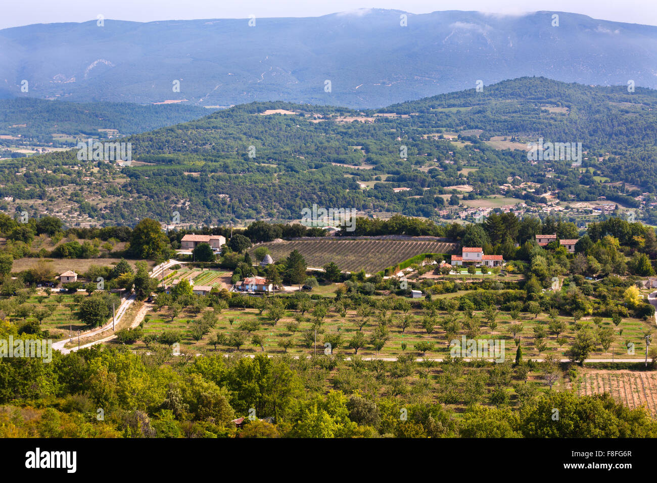 Landscape of rural Provence with hills, woods, fields and villages ...