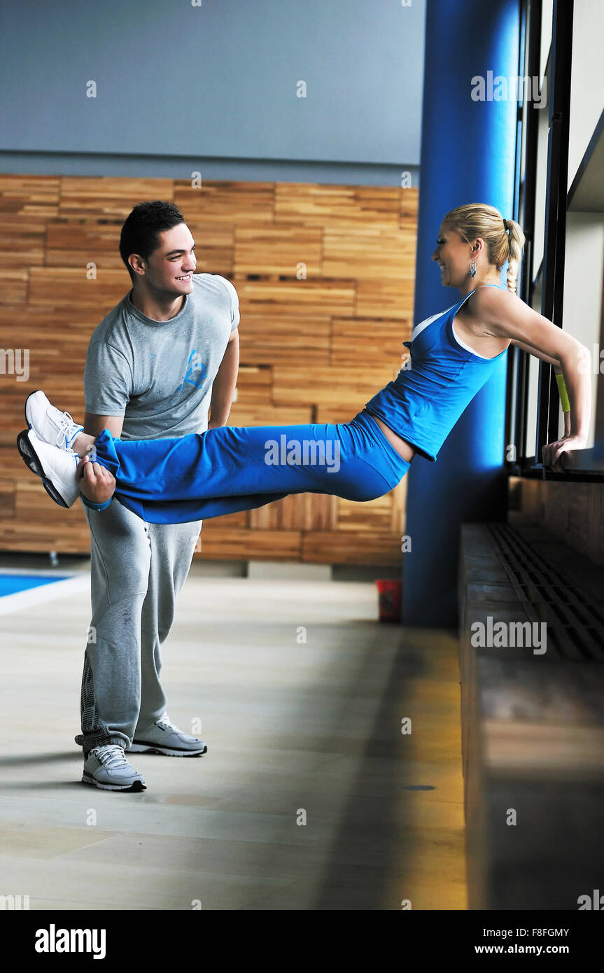 fitness personal trainer on fitness classes supporting group of people ...