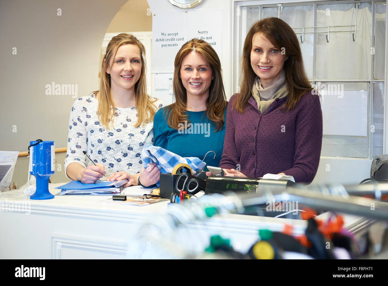 Three Female Volunteers Workers In Charity Shop Stock Photo - Alamy