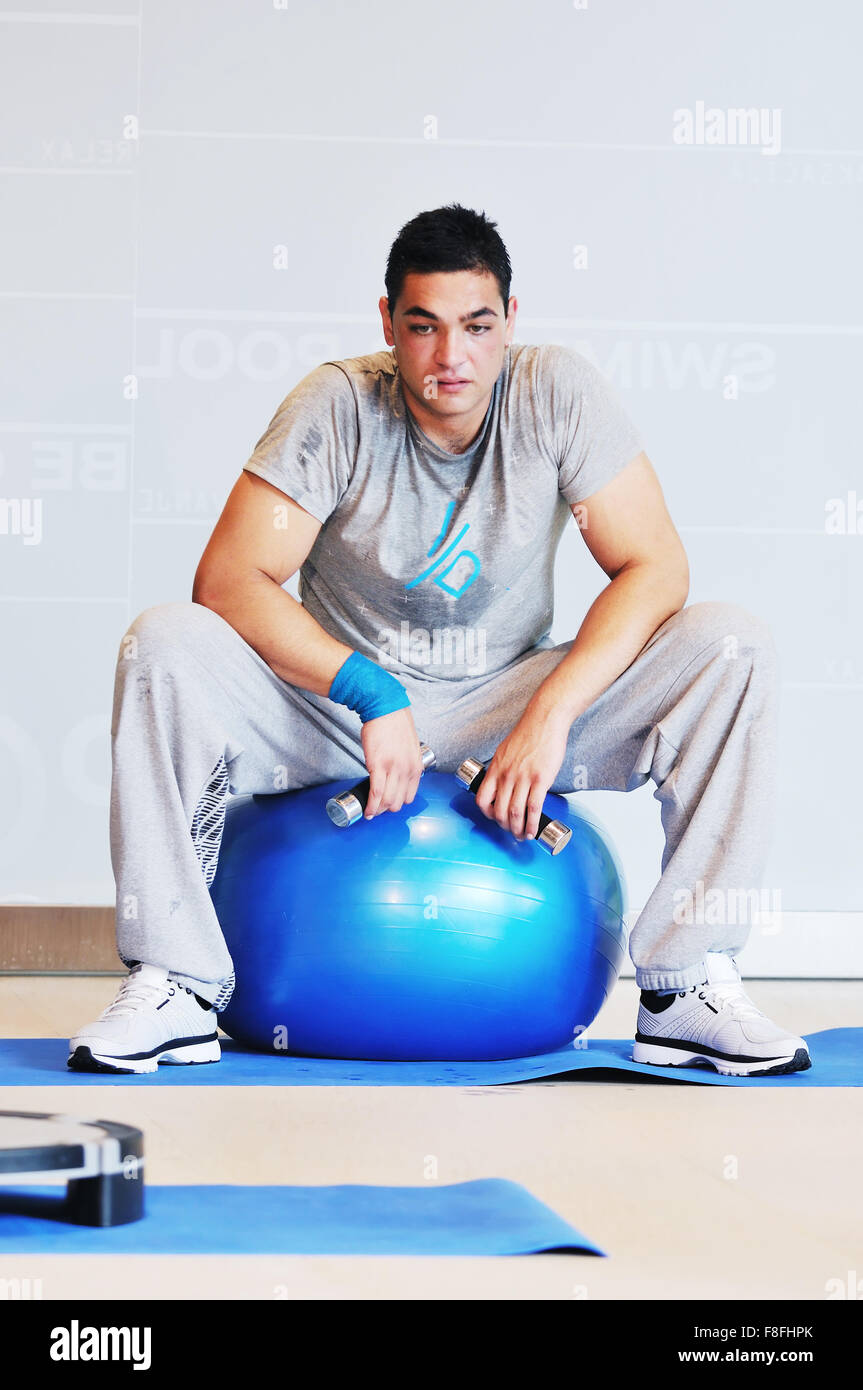 one young healthy man exercice fitness recreation and yoga indoor Stock ...