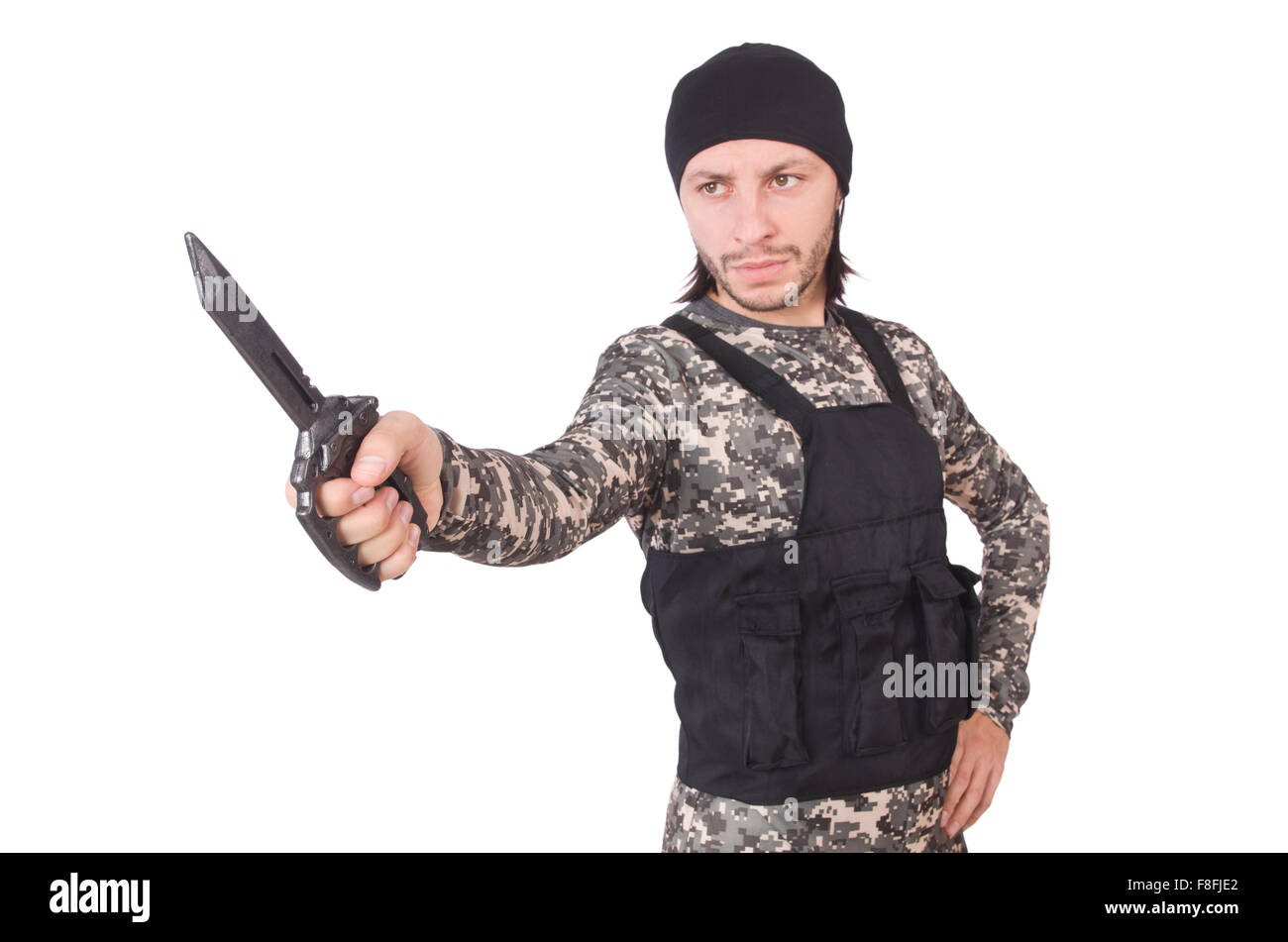 Young man in military uniform holding knife isolated on white Stock ...