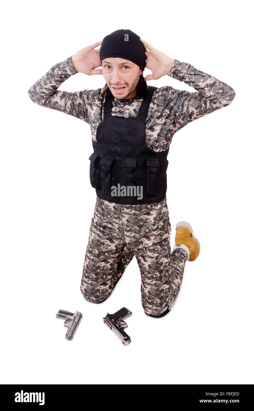 Surrendering man in military uniform holding gun isolated on white ...