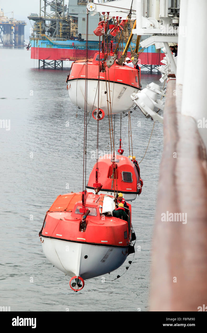 Lifeboats lowered hi-res stock photography and images - Alamy