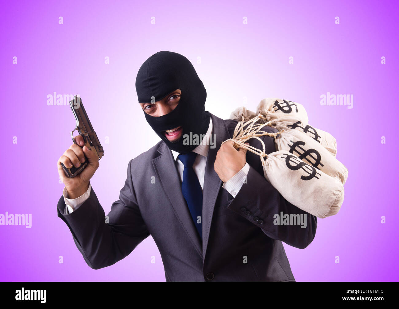 Gangster with bags of money against the gradient Stock Photo - Alamy