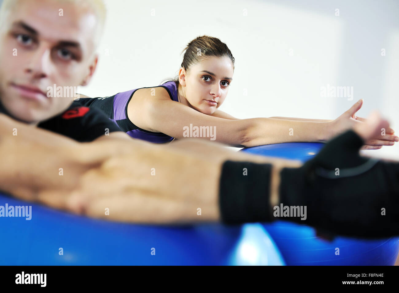 woman exercise fitness and get nice fit shape in fitness sport club ...