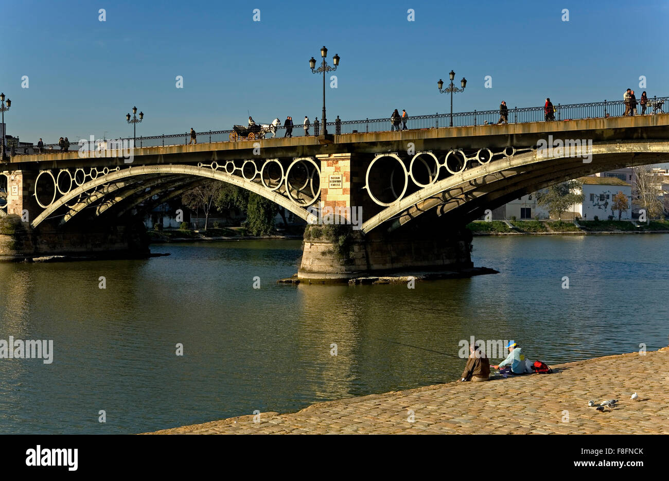 Isabel II bridge or Triana bridge. Guadalquivir river. Seville ...