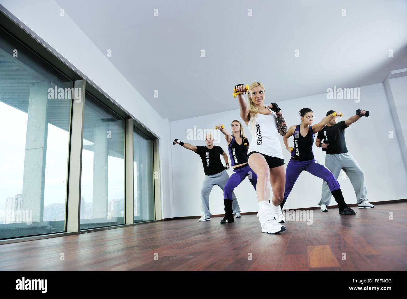 young healthy people group exercise fitness and get fit Stock Photo - Alamy