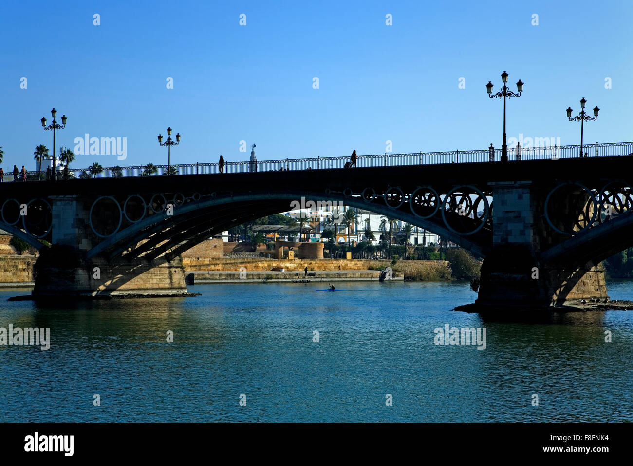 Isabel II bridge or Triana bridge. Guadalquivir river. Seville ...