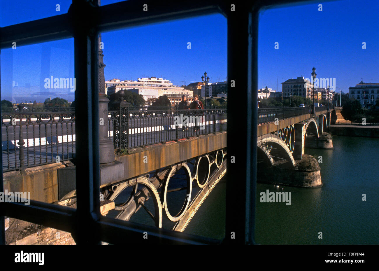 Sevilla: Isabel II bridge or Triana bridge. From a window. Guadalquivir ...