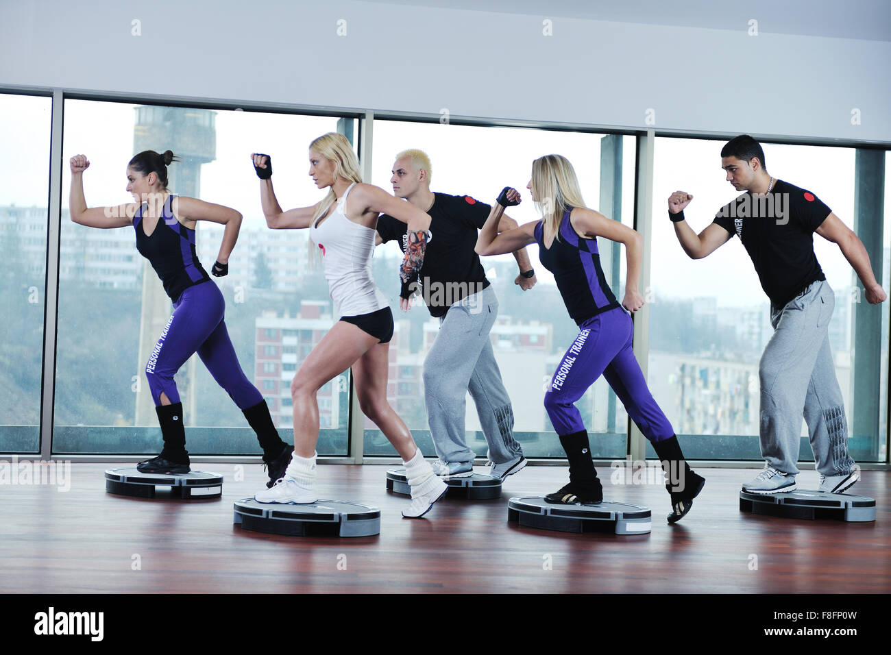 young healthy people group exercise fitness and get fit Stock Photo - Alamy