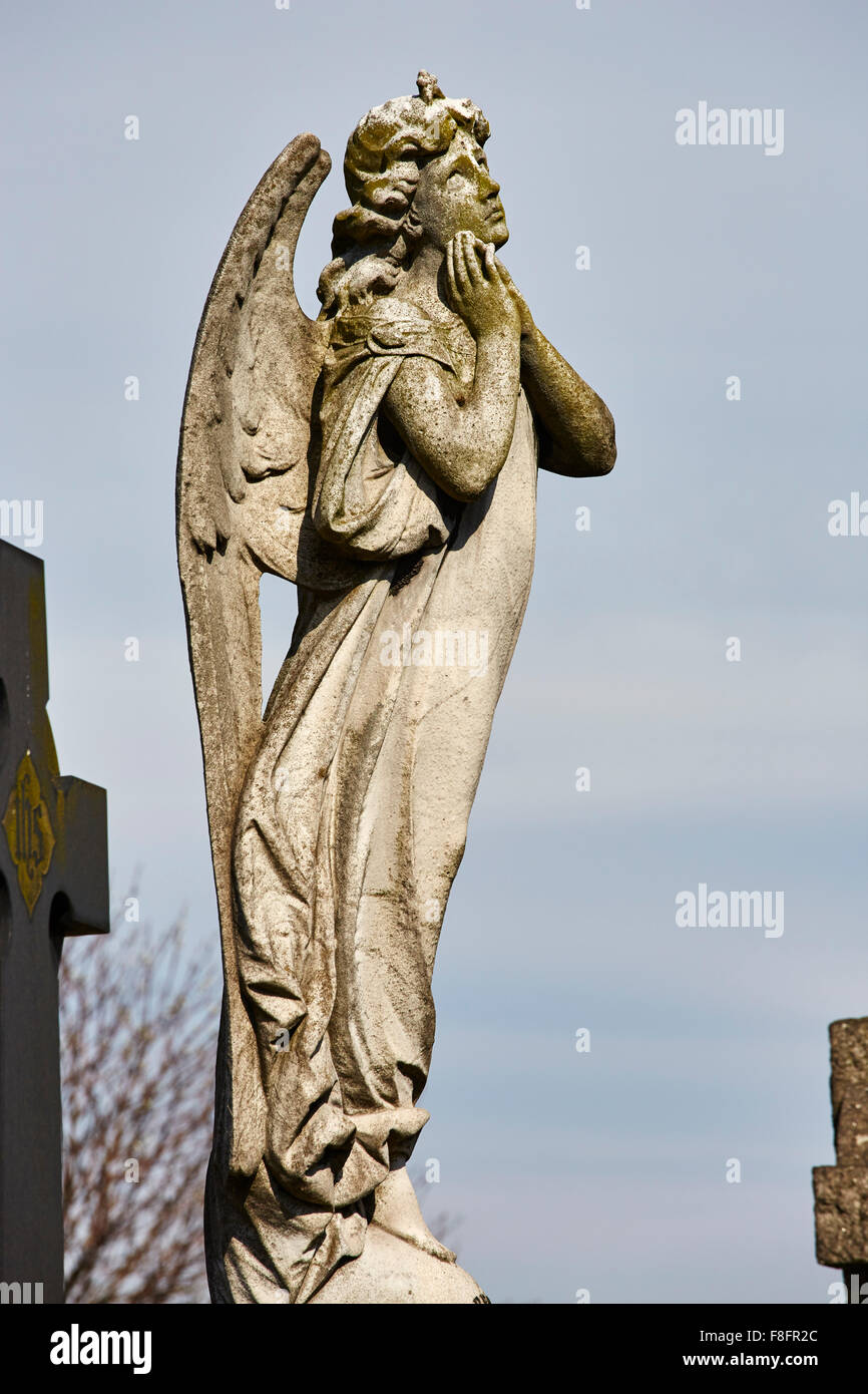 Historic stone sculpture depicting an angel in Church Cemetery ...