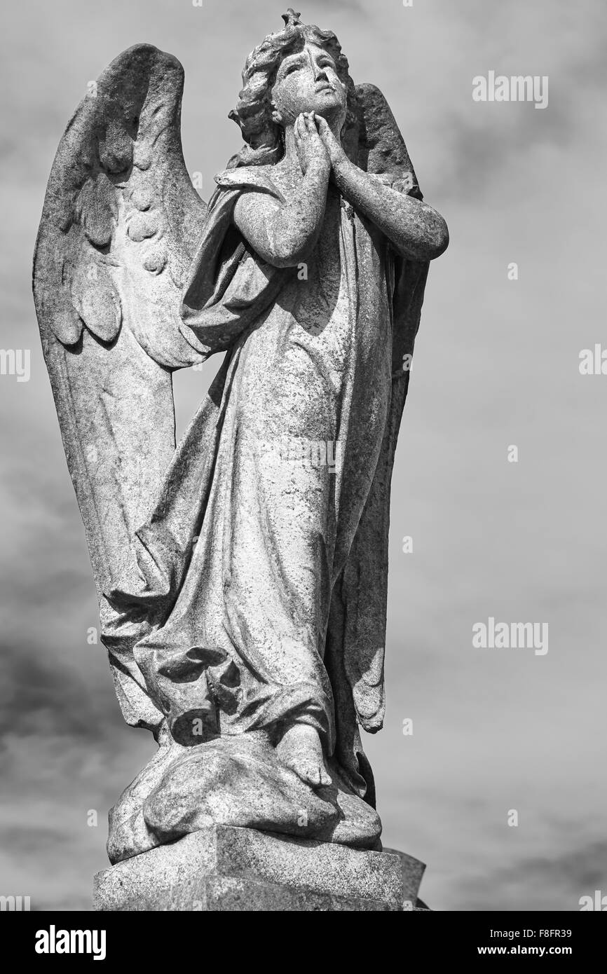 Historic stone sculpture depicting an angel in Church Cemetery ...