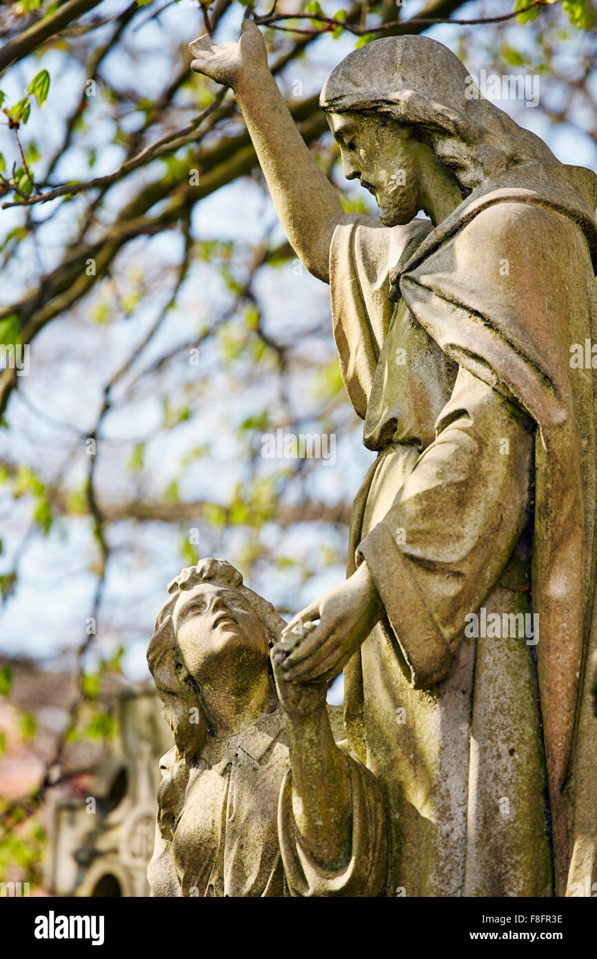 Historic stone sculpture depicting Jesus in Church Cemetery, Nottingham ...