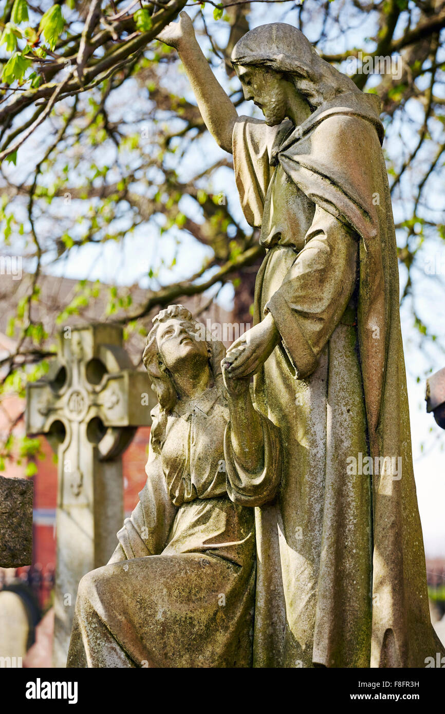 Historic stone sculpture depicting Jesus in Church Cemetery, Nottingham ...