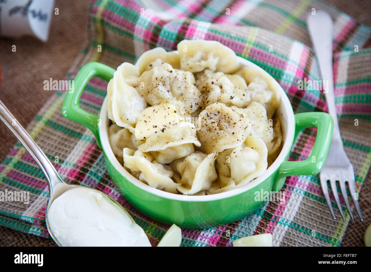 Russian dumplings boiled with meat Stock Photo - Alamy