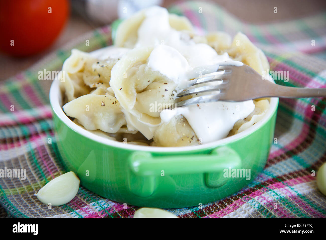 Russian dumplings boiled with meat Stock Photo - Alamy