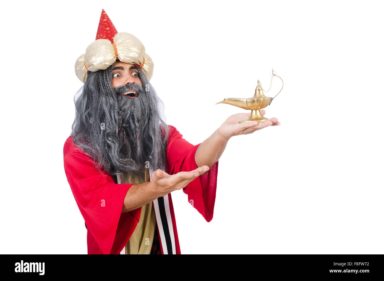 Old wizard with lamp isolated on white Stock Photo - Alamy