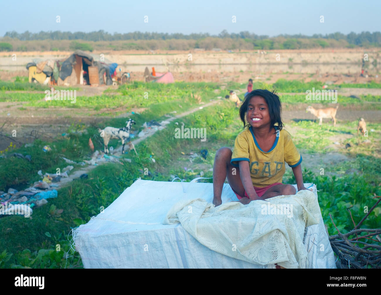 Indian poor girl smile hi-res stock photography and images - Alamy